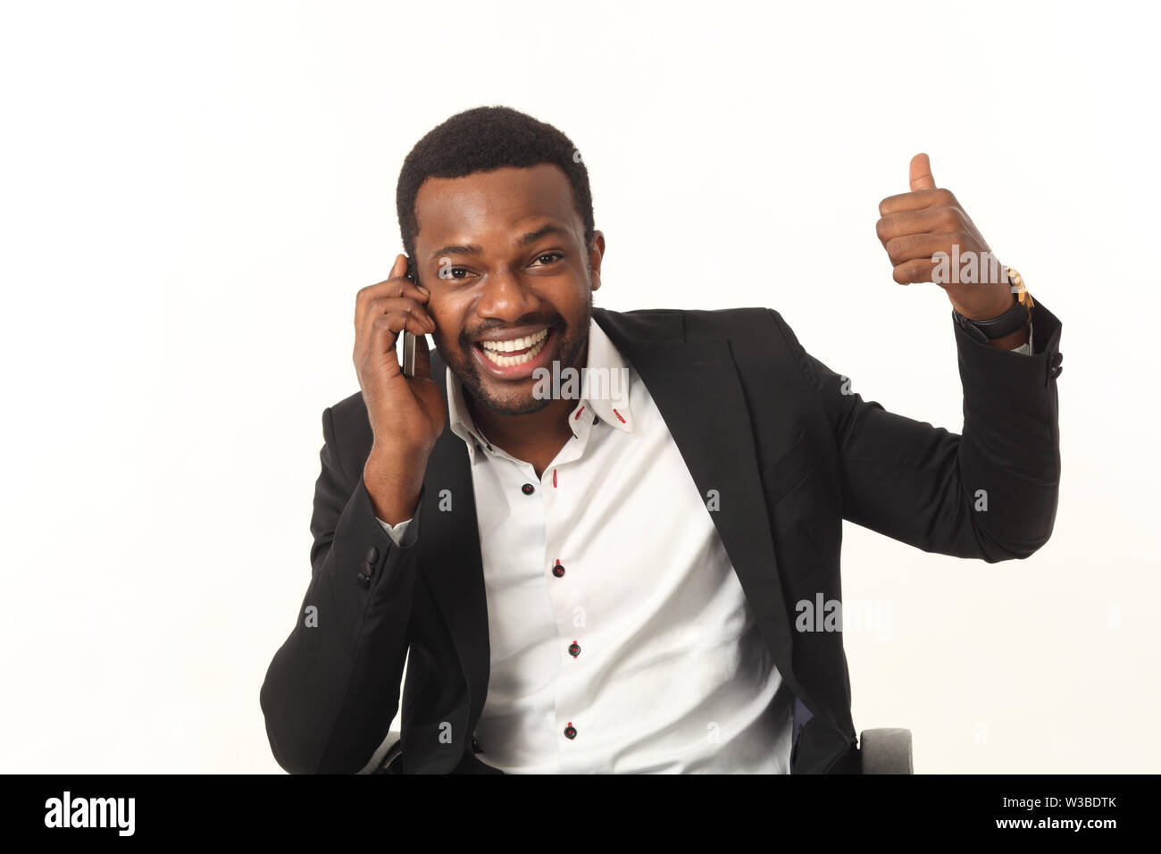 Thumbs up african man using hi-res stock photography and images - Alamy