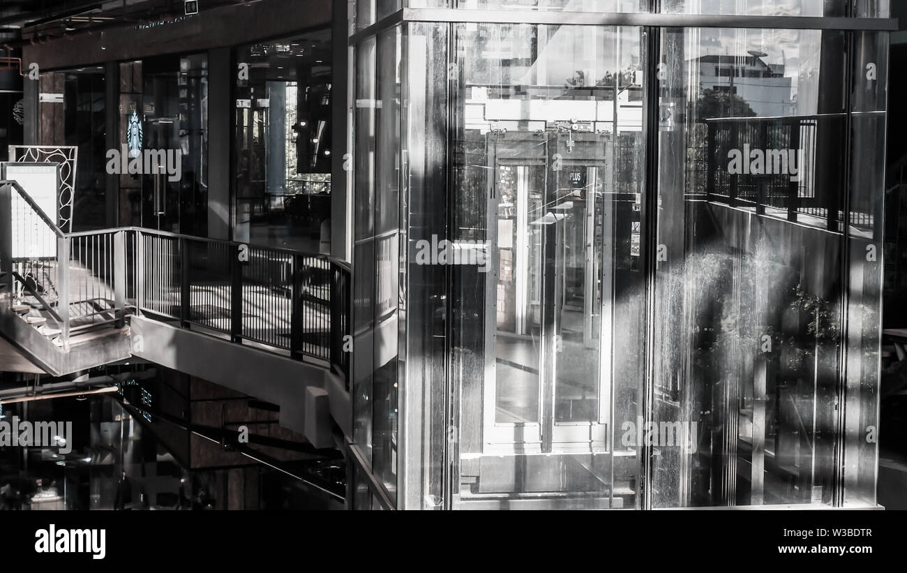 Elevator door through window hi-res stock photography and images - Alamy