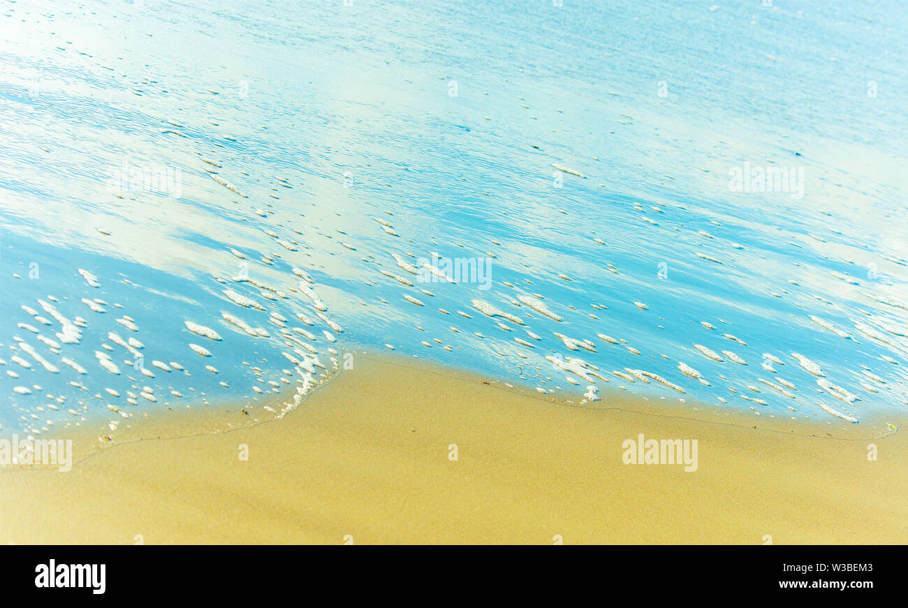 surf in sandy sea beach Stock Photo - Alamy