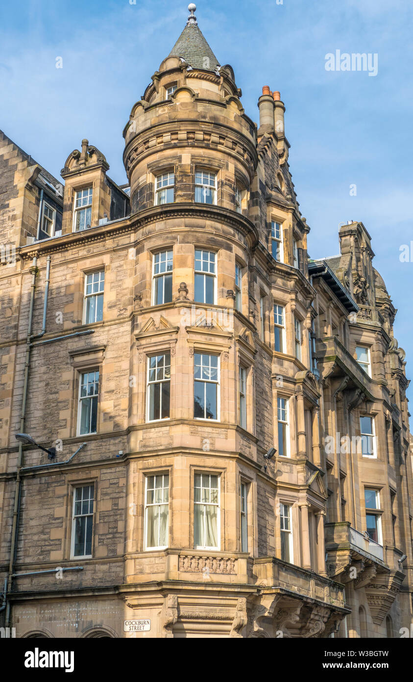 Sunlit architecture of a beautiful multi storey period building on the ...