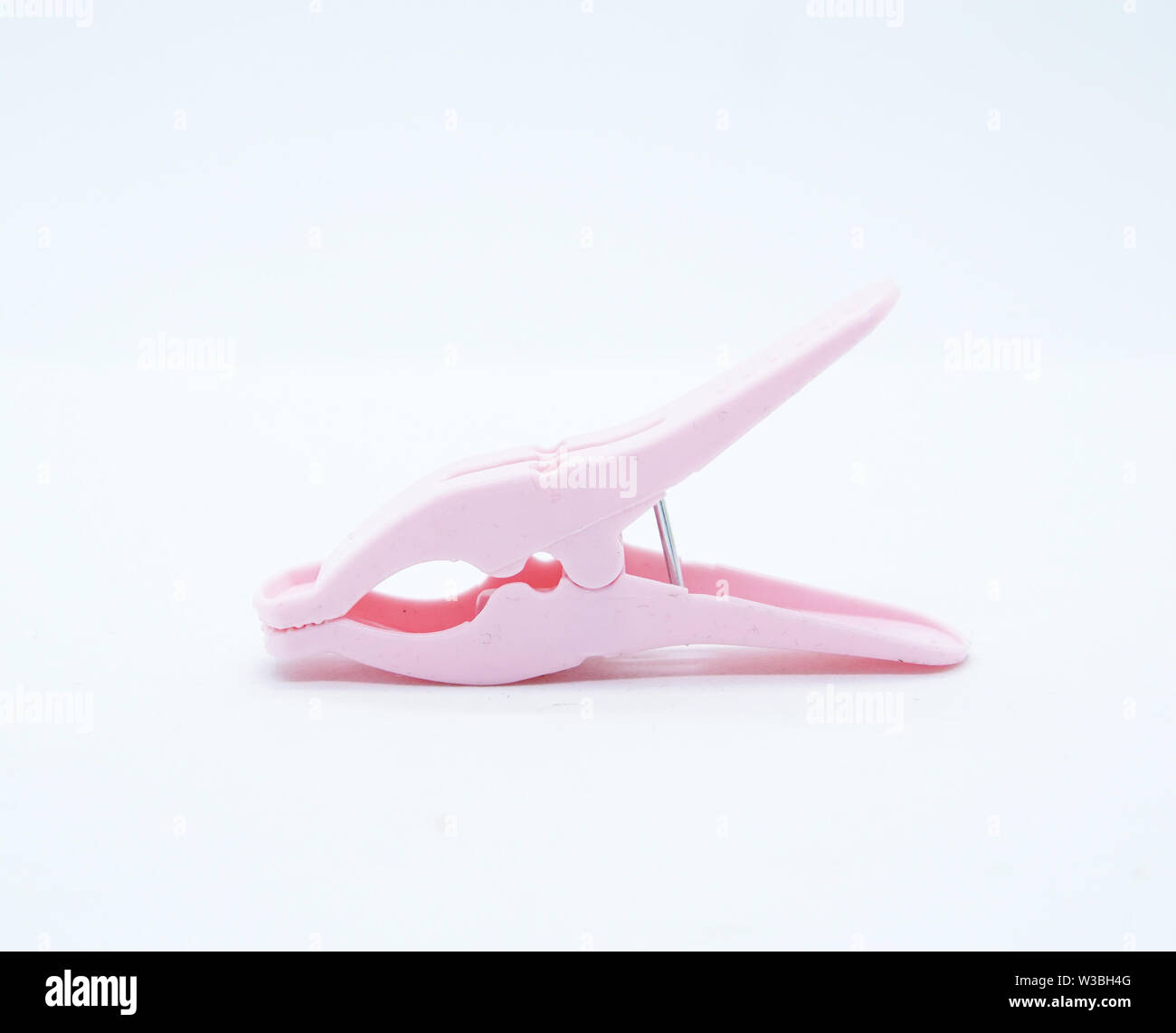 color plastic clothes pin for drying clothes Stock Photo - Alamy