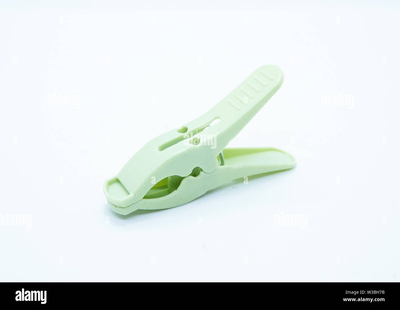 color plastic clothes pin for drying clothes Stock Photo - Alamy