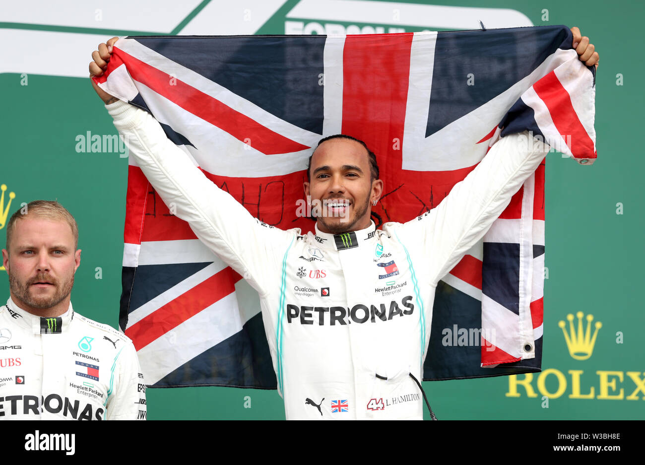 Mercedes' Lewis Hamilton celebrates winning the British Grand Prix at ...