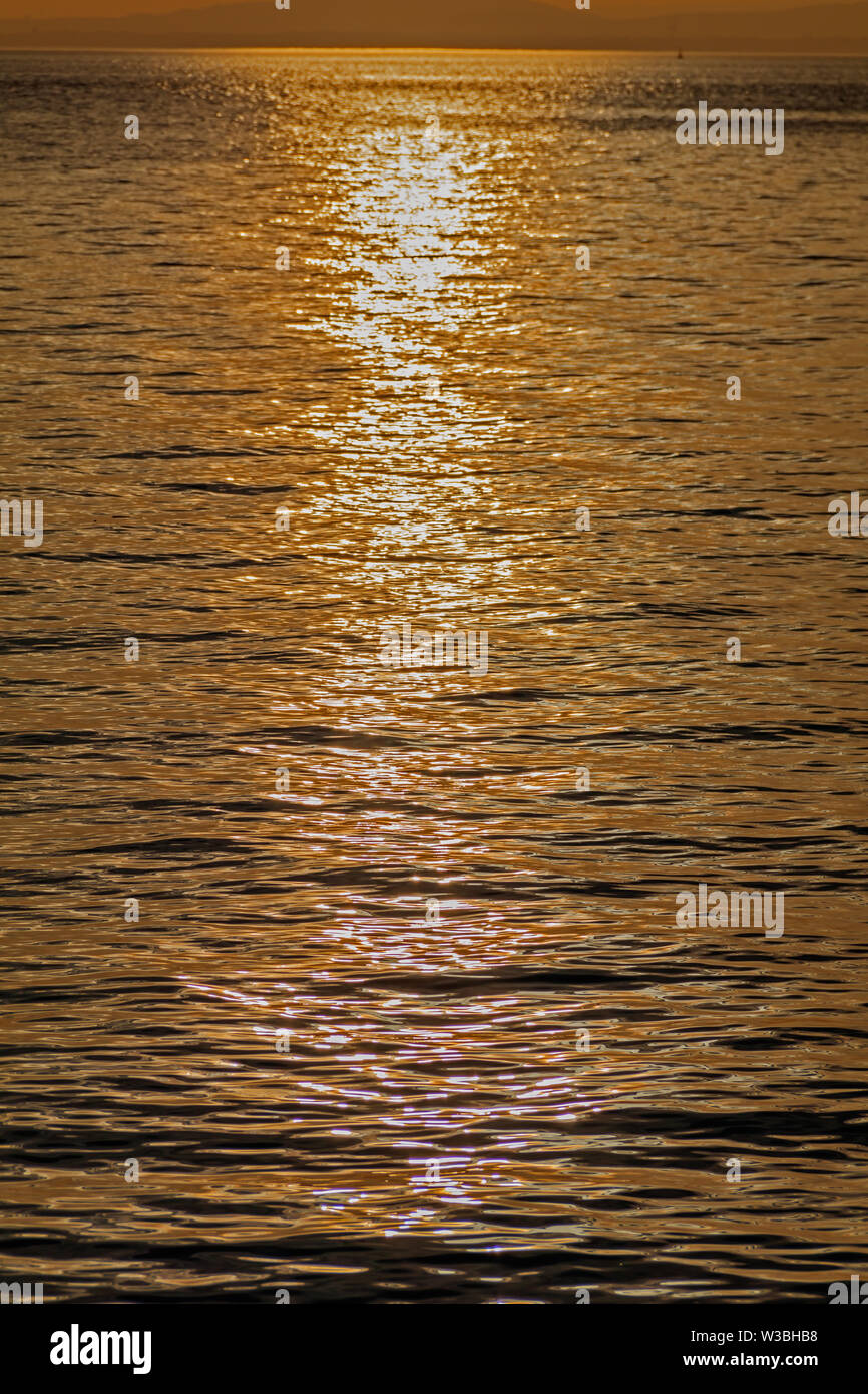 Serene view sparkling sunlight reflecting hi-res stock photography and ...