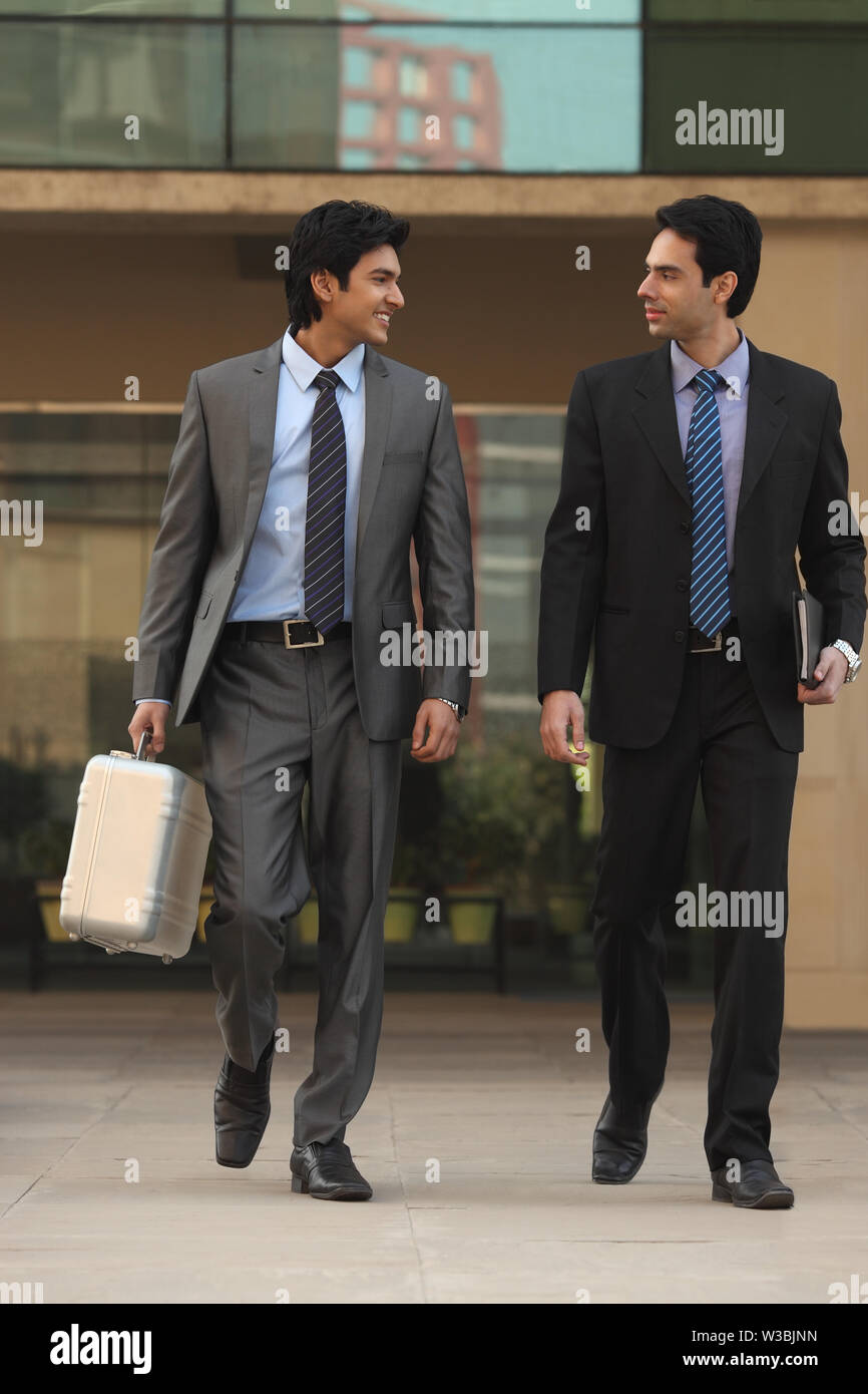 Two business executives discussing in an office Stock Photo - Alamy