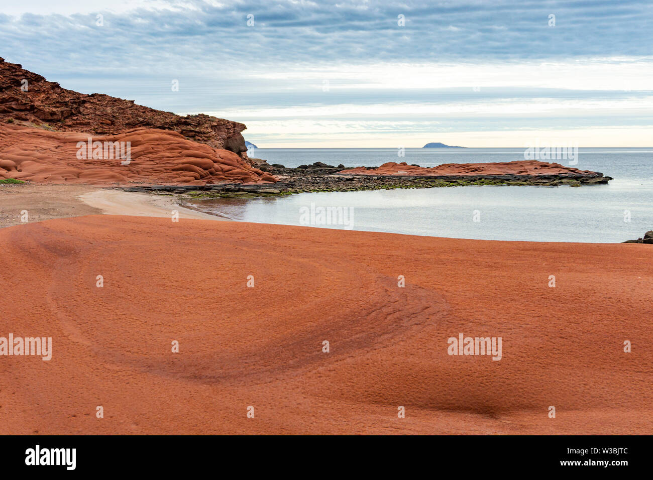 red rock formation on an empty beach in Baja California, Mexico Stock ...