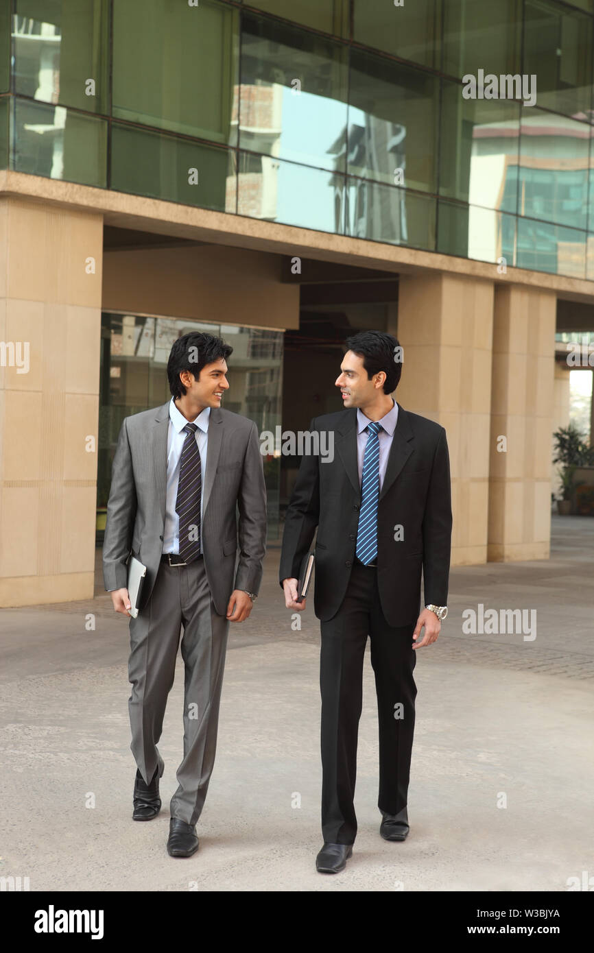 Two business executives discussing in an office Stock Photo - Alamy
