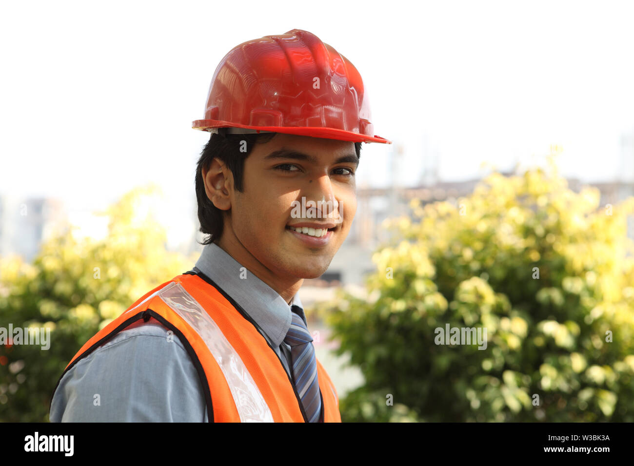 Portrait of a male architect smiling Stock Photo - Alamy