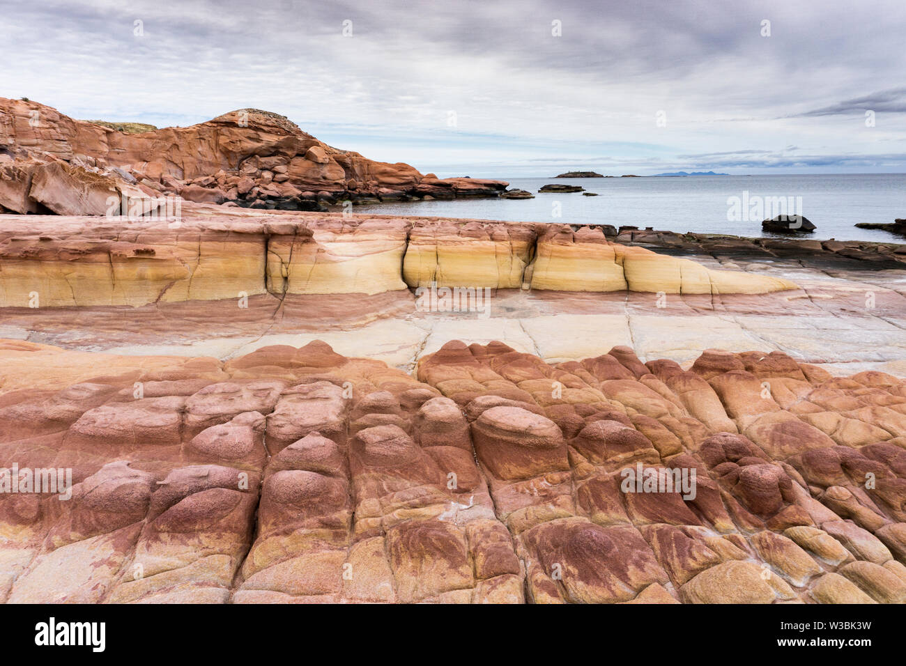 red rock formation on an empty beach in Baja California, Mexico Stock ...