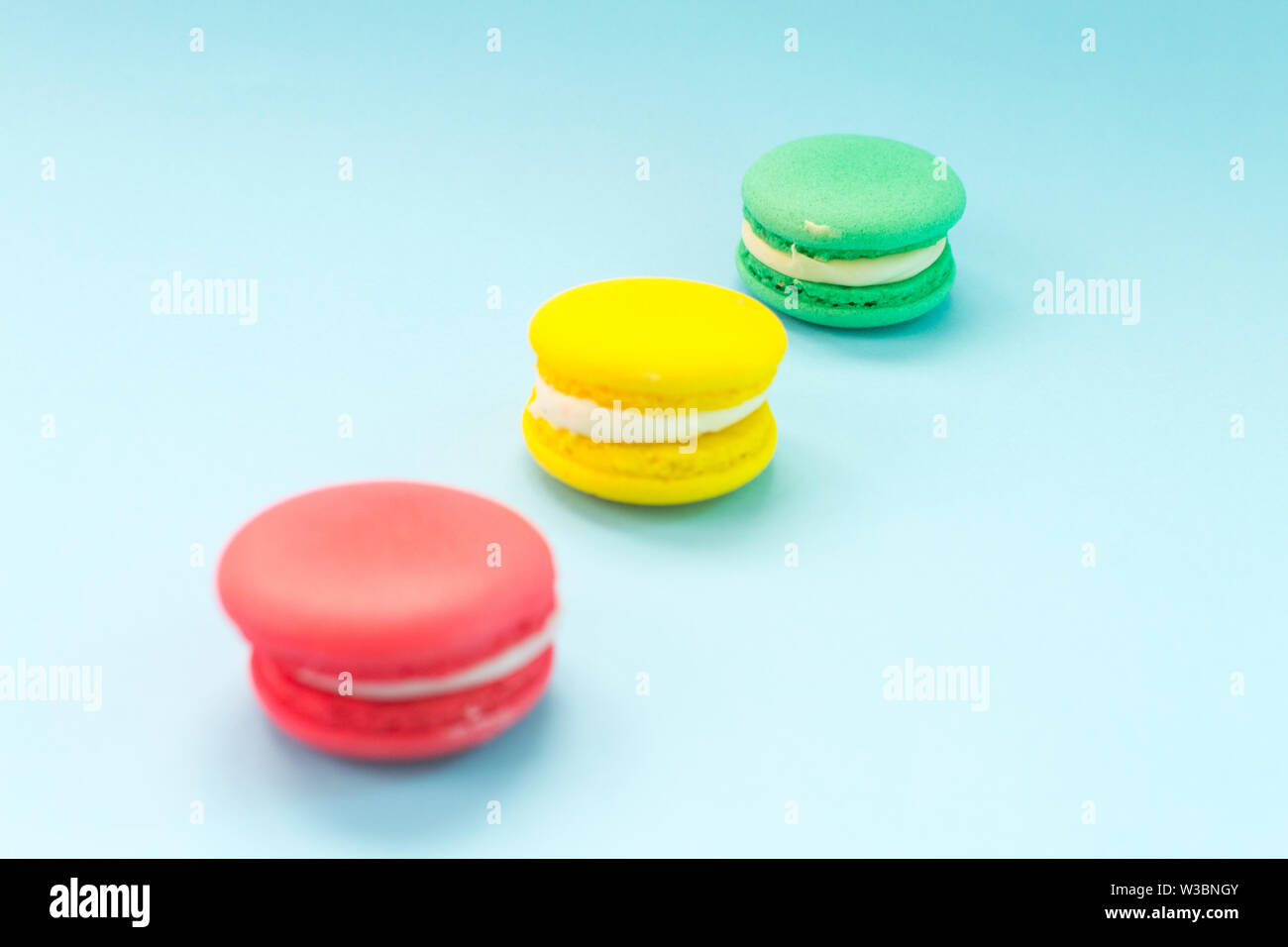 Close-up shot of colored macaroons in different position Stock Photo ...