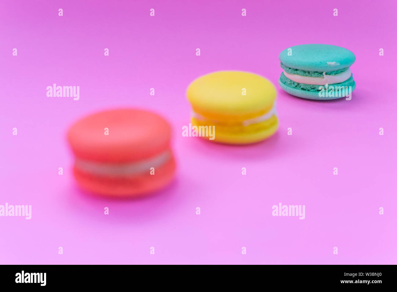 Close-up shot of colored macaroons in different position Stock Photo ...