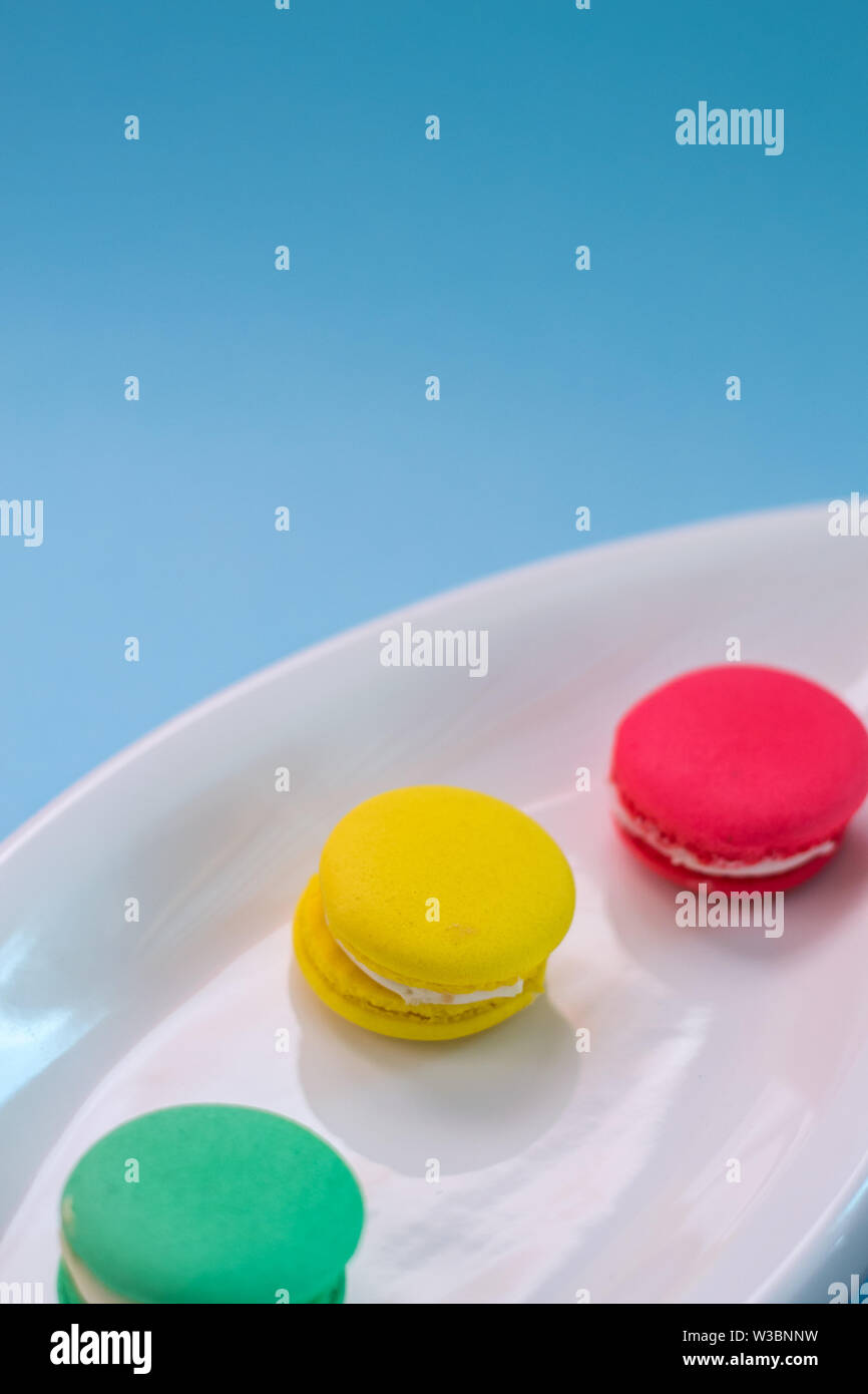 Close-up shot of colored macaroons in different position Stock Photo ...