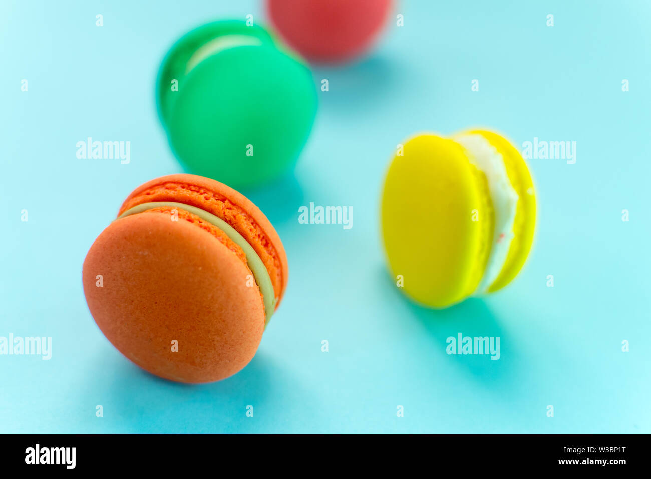 Close-up shot of colored macaroons in different position Stock Photo ...