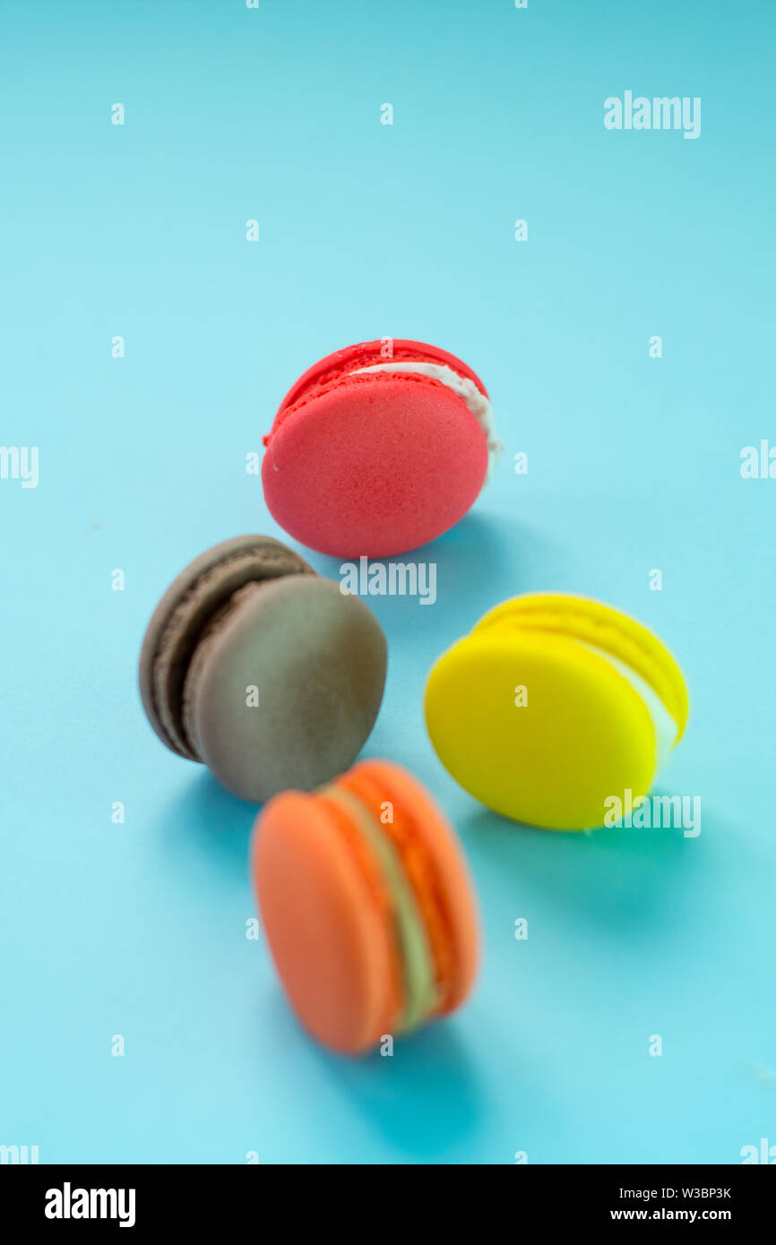Close-up shot of colored macaroons in different position Stock Photo ...