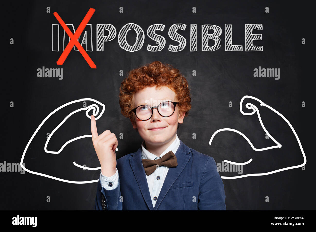 Strong clever child boy with text possible on black background. Success ...