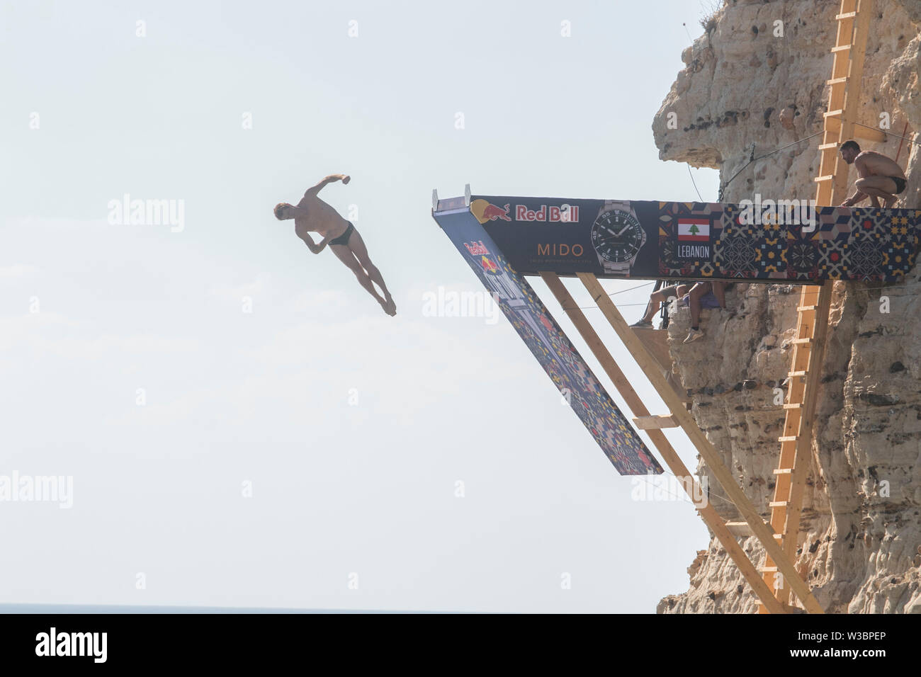Beirut, Lebanon. 14th July 2019. Male and female competitors jump off ...