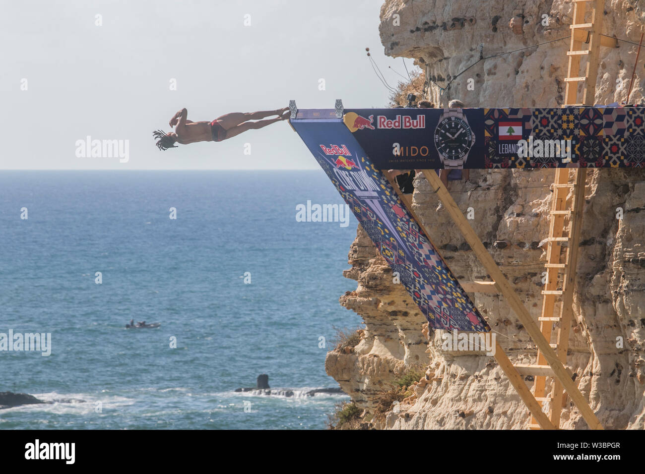 Beirut, Lebanon. 14th July 2019. Male and female competitors jump off ...