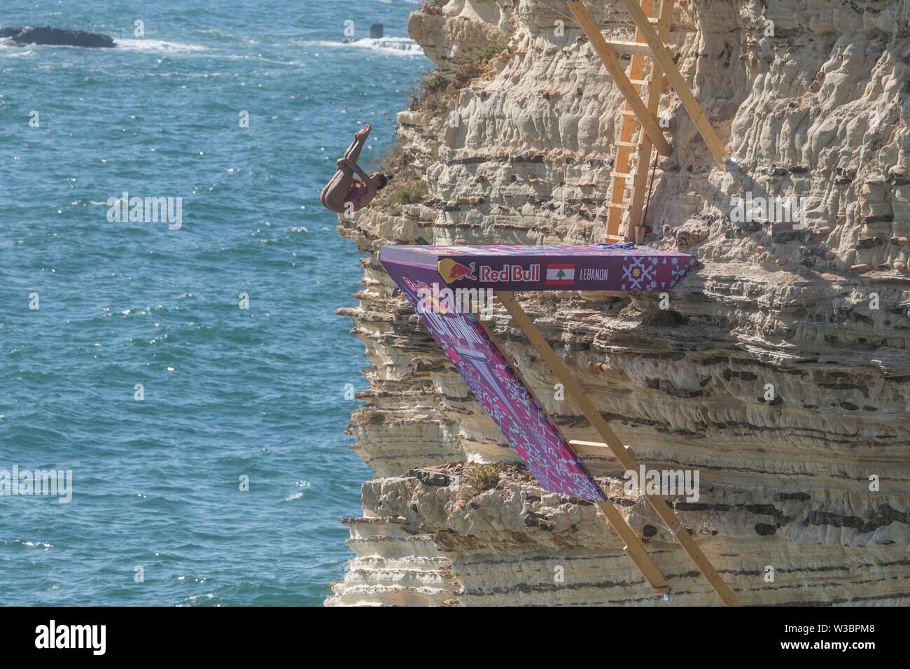 Beirut, Lebanon. 14th July 2019. Male and female competitors jump off ...