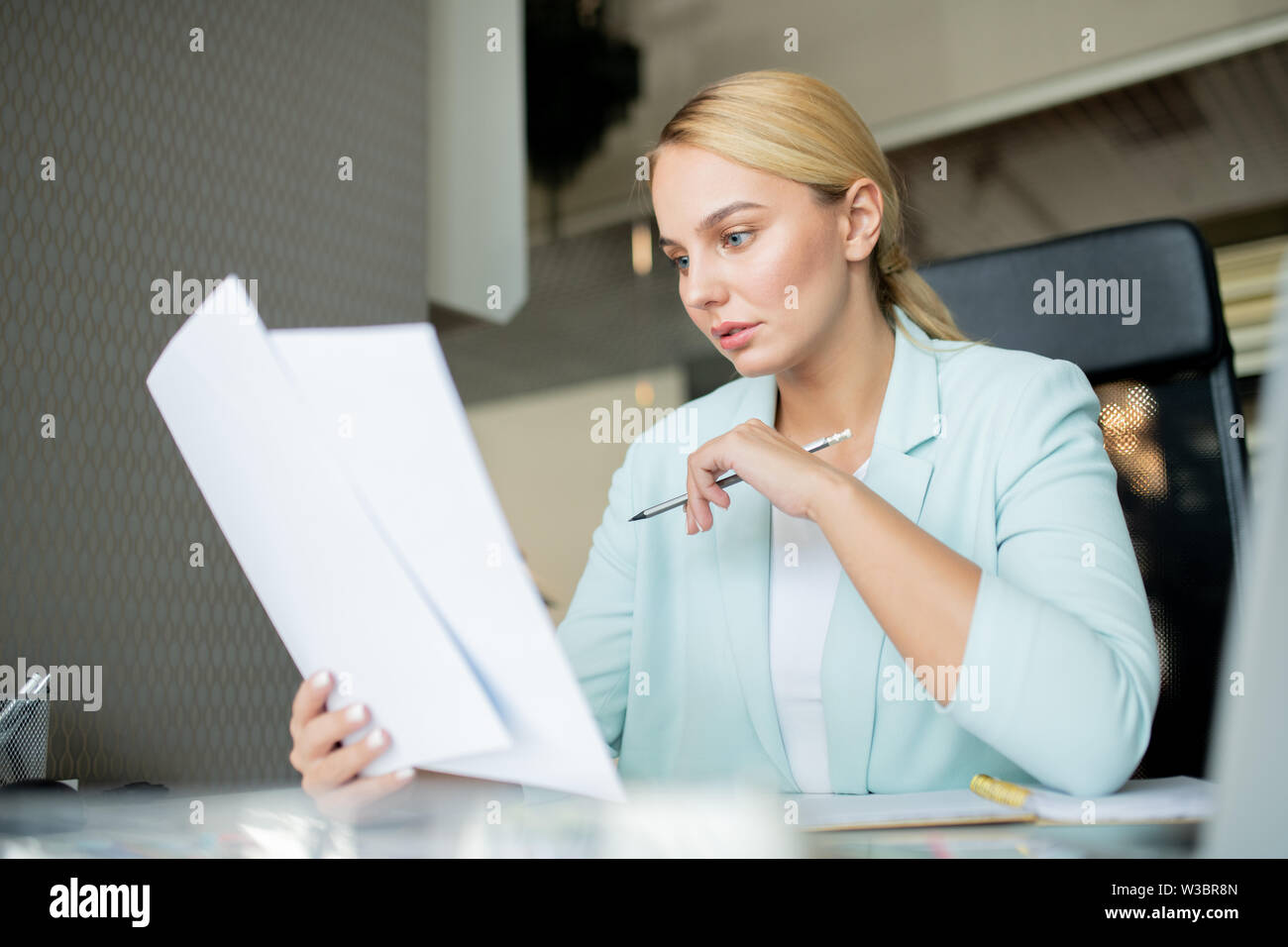 Serious teacher young with students hi-res stock photography and images ...