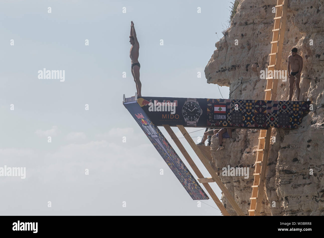Beirut, Lebanon. 14th July 2019. Male and female competitors jump off ...