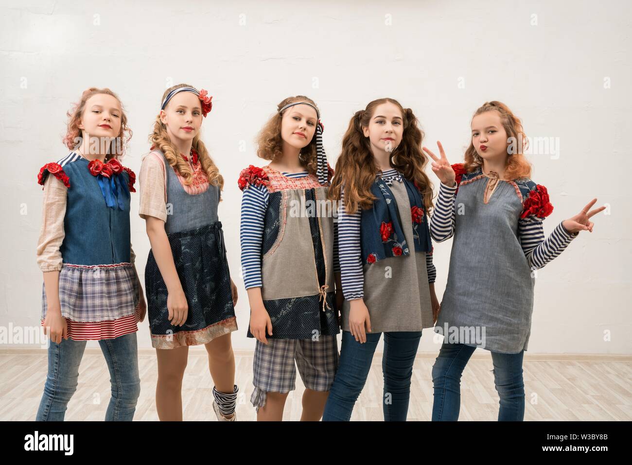 Pretty girls in original style costumes shot Stock Photo - Alamy