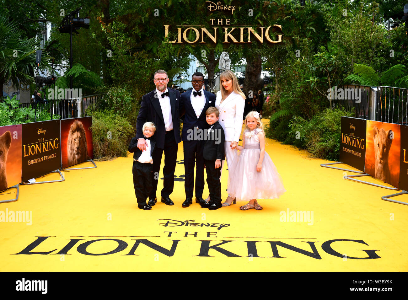 Guy Ritchie, Jacqui Ritchie and family attending Disney's The Lion King ...