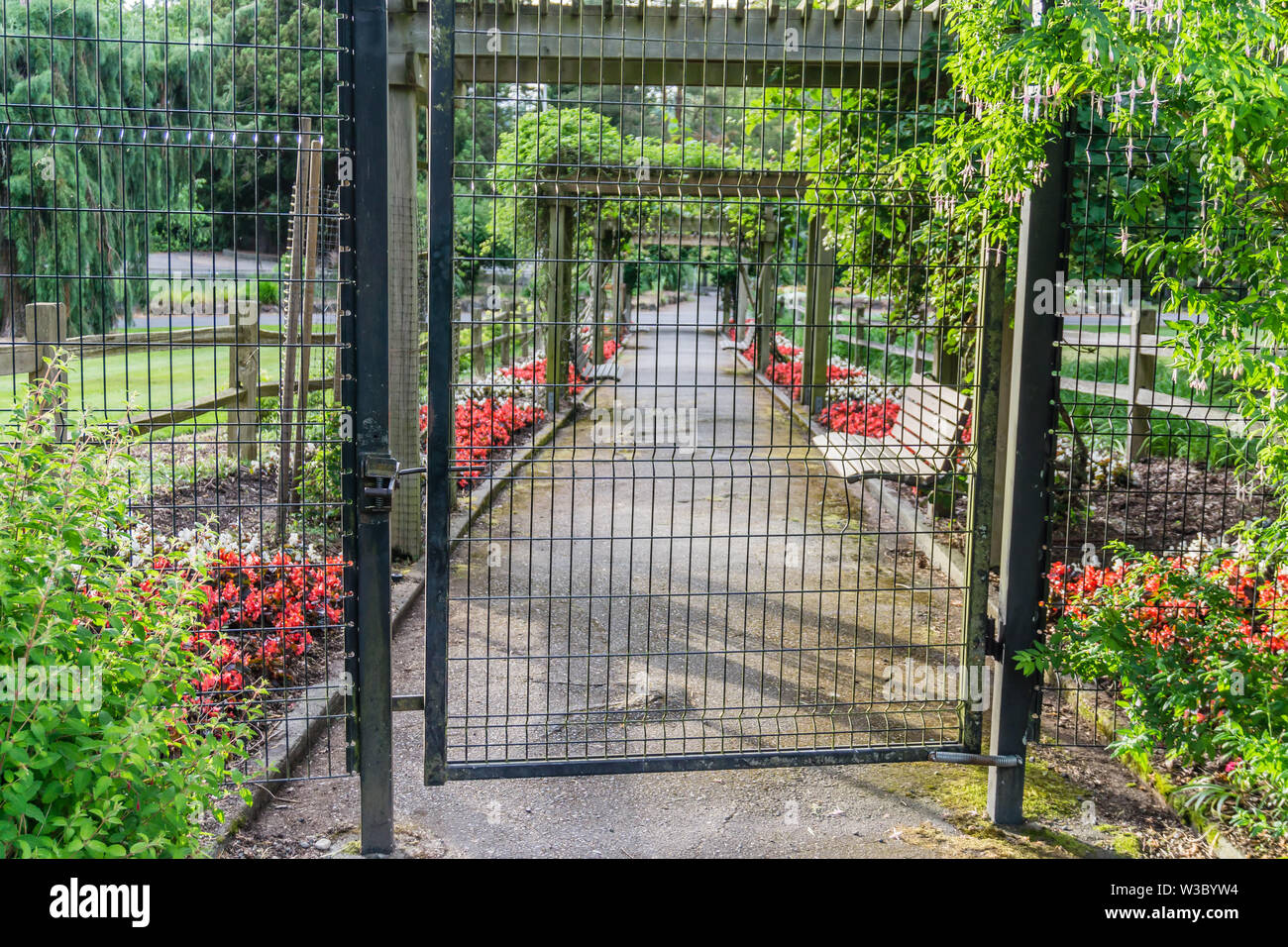 A view of a gate and walkway at the rose garden in Point Defiance Park ...