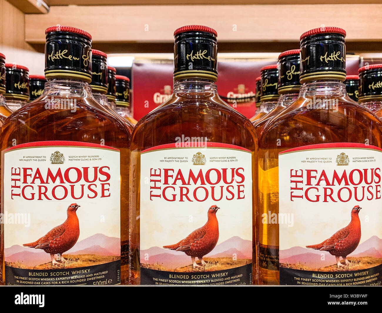 Bottles of the Blended Scotch Whisky brand "The famous grouse" on a ...