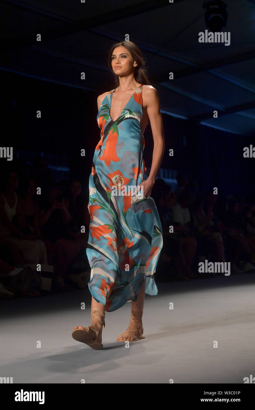 MIAMI BEACH, FLORIDA - JULY 13: A model walks the runway for Sinesia ...