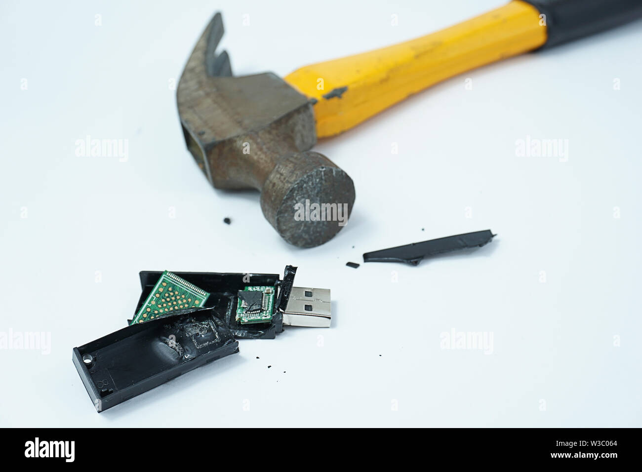 Old hammer break usb, egg, pencil isolated on white background series ...