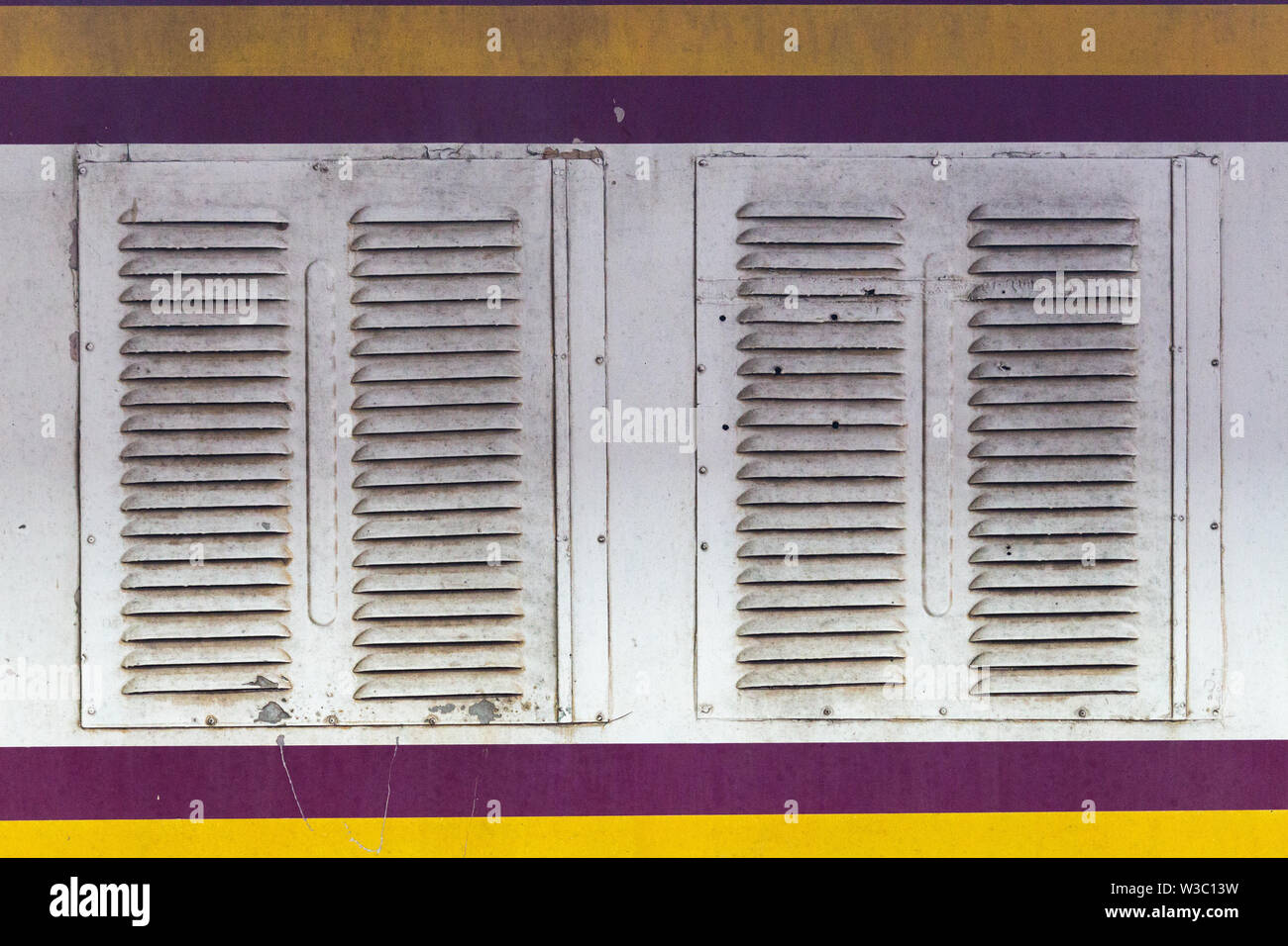 White metal windows on a carriage of a thailandese railways train Stock ...