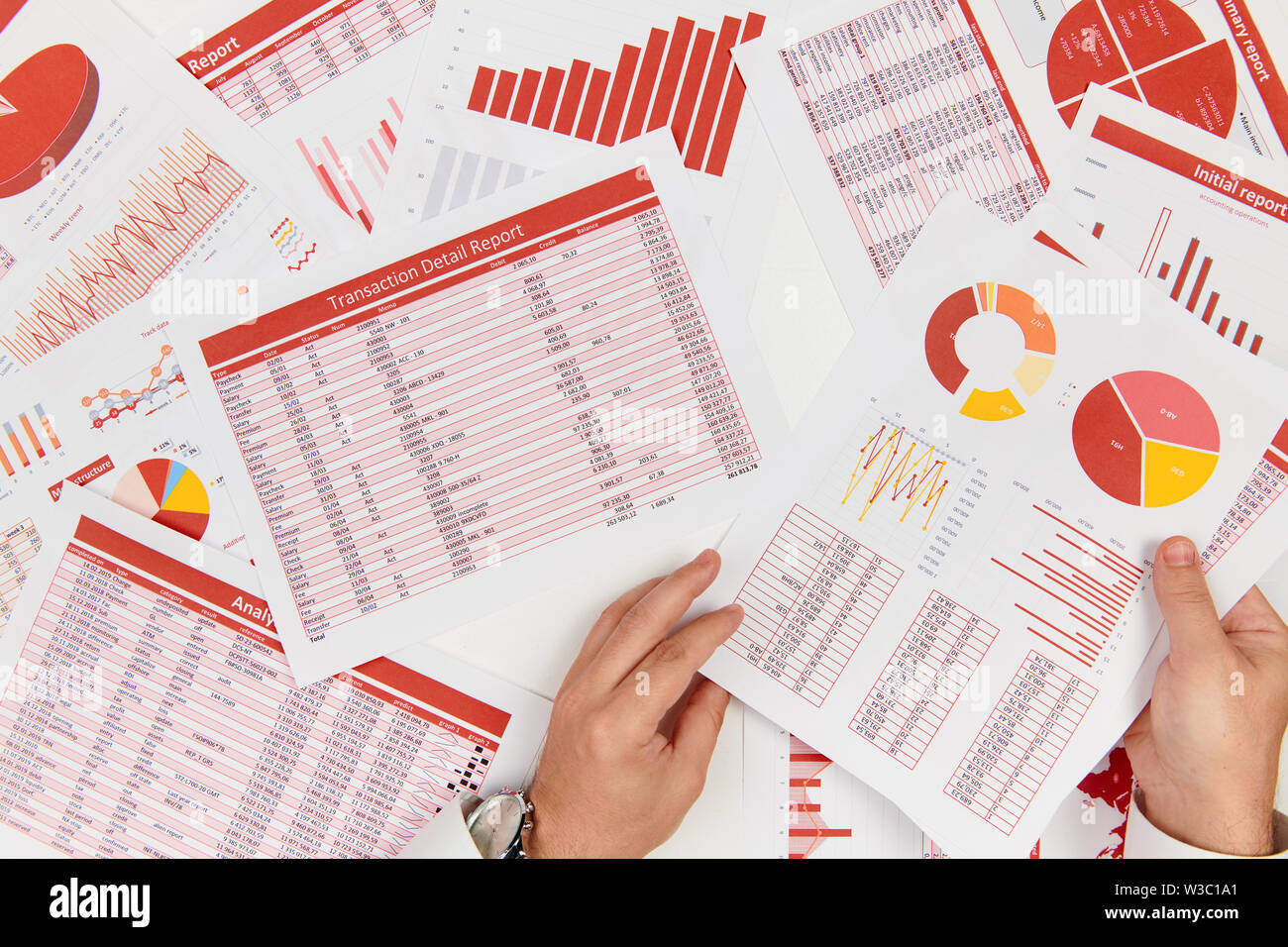 Business reports, data tables and charts - directly above view of ...