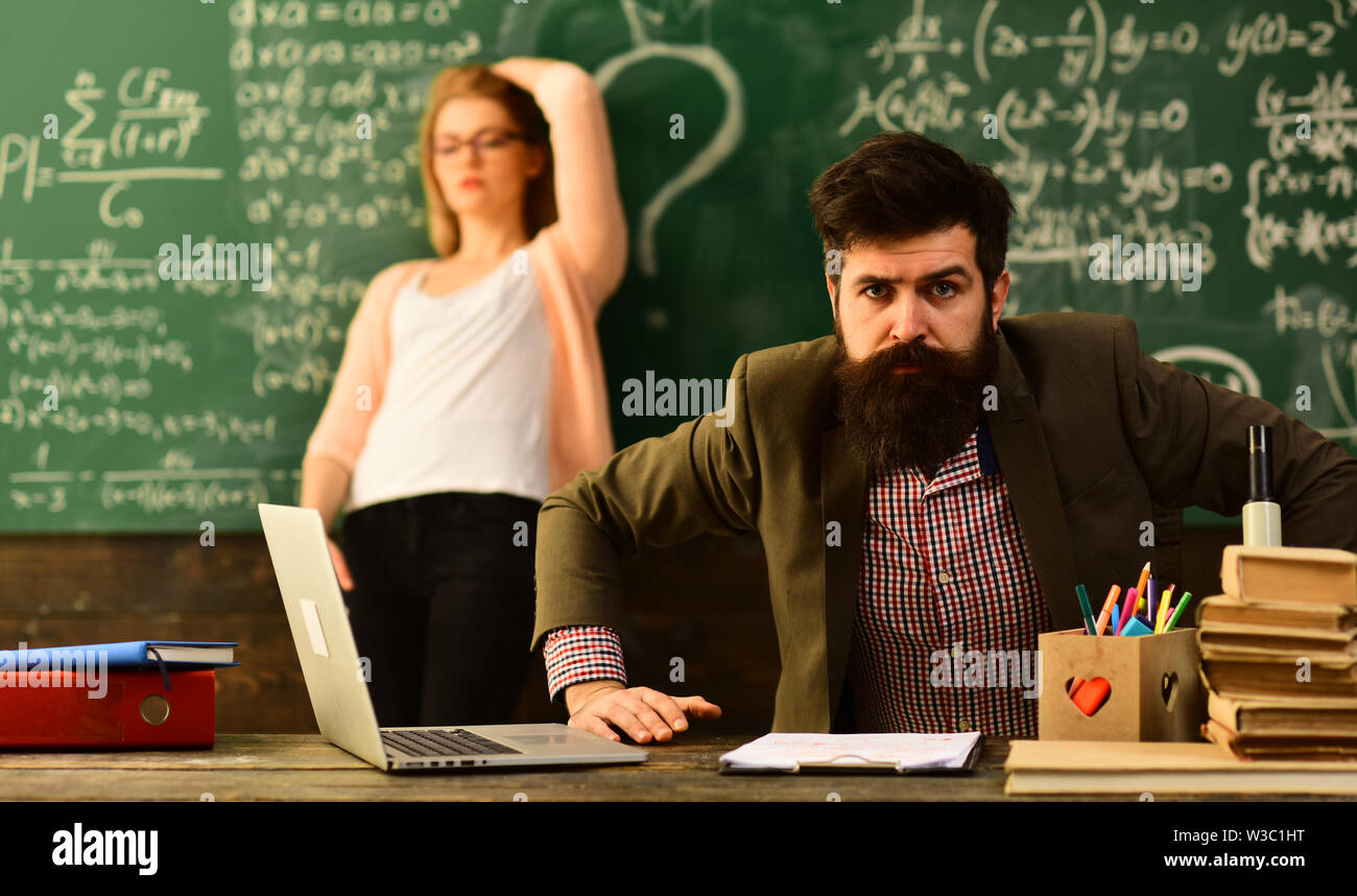 International student making individual online testing, Teacher has his ...