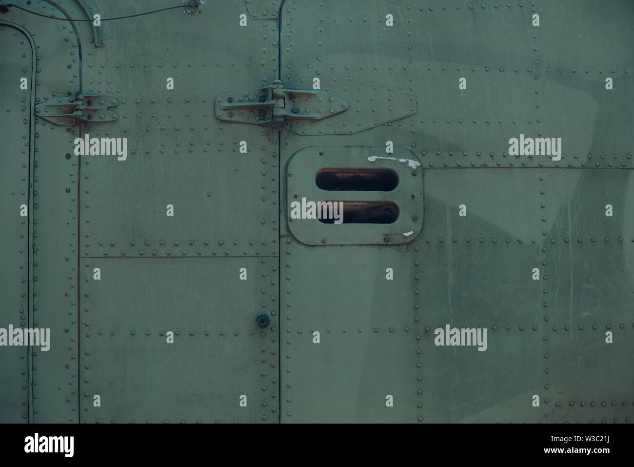 Aircraft covering detail on metallized background. Fuselage metal ...