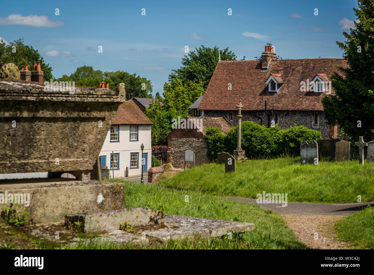Churchyard of St Mary Magdalene parish church built in 13th century ...