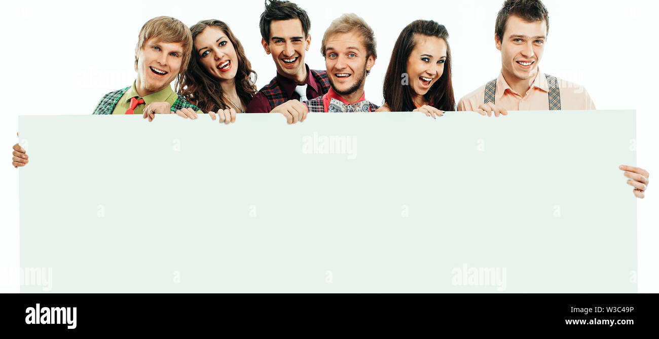 Group of happy people with banner Stock Photo - Alamy