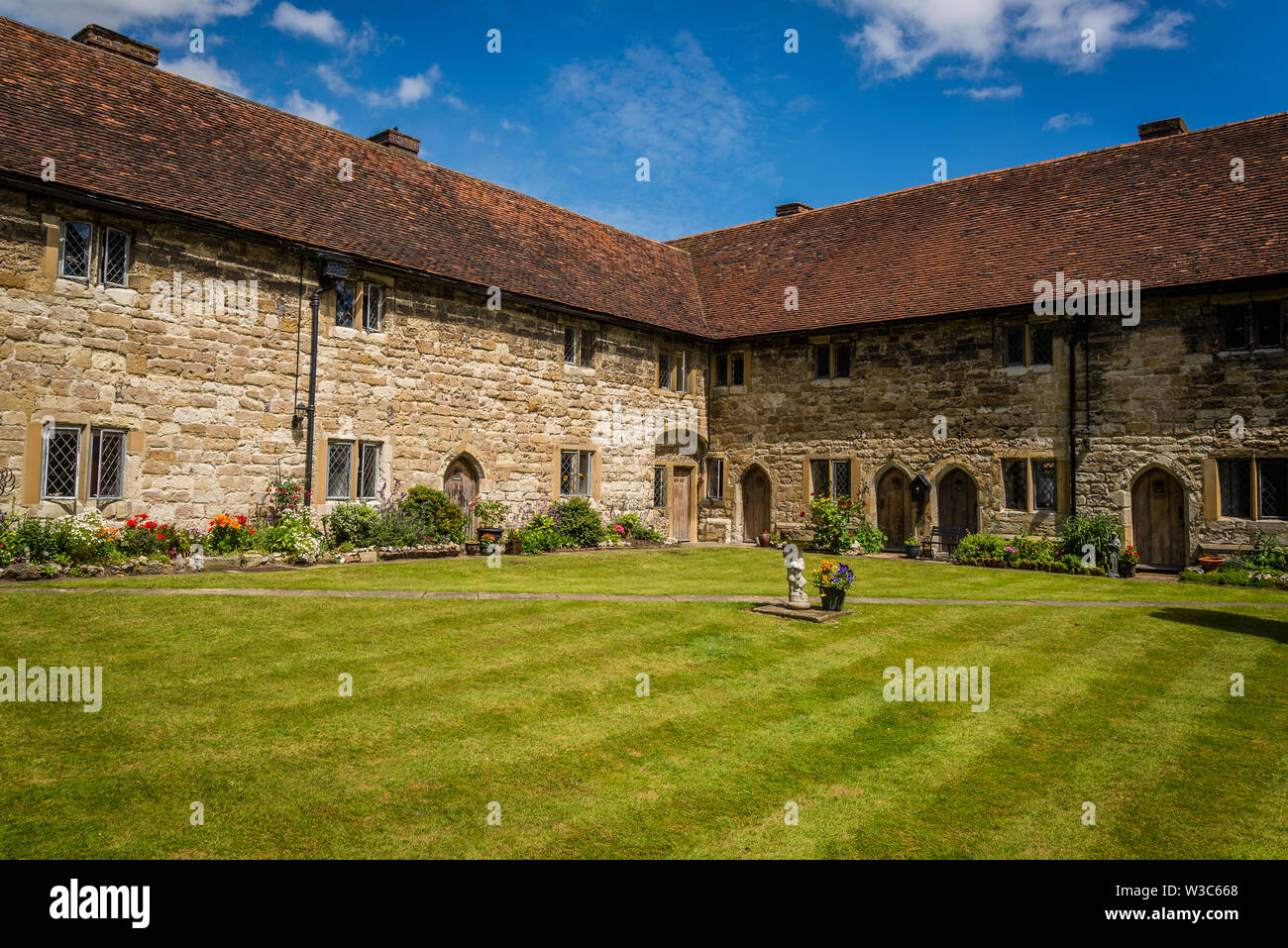 The New College of Cobham, a one-time home for secular priests, and now ...