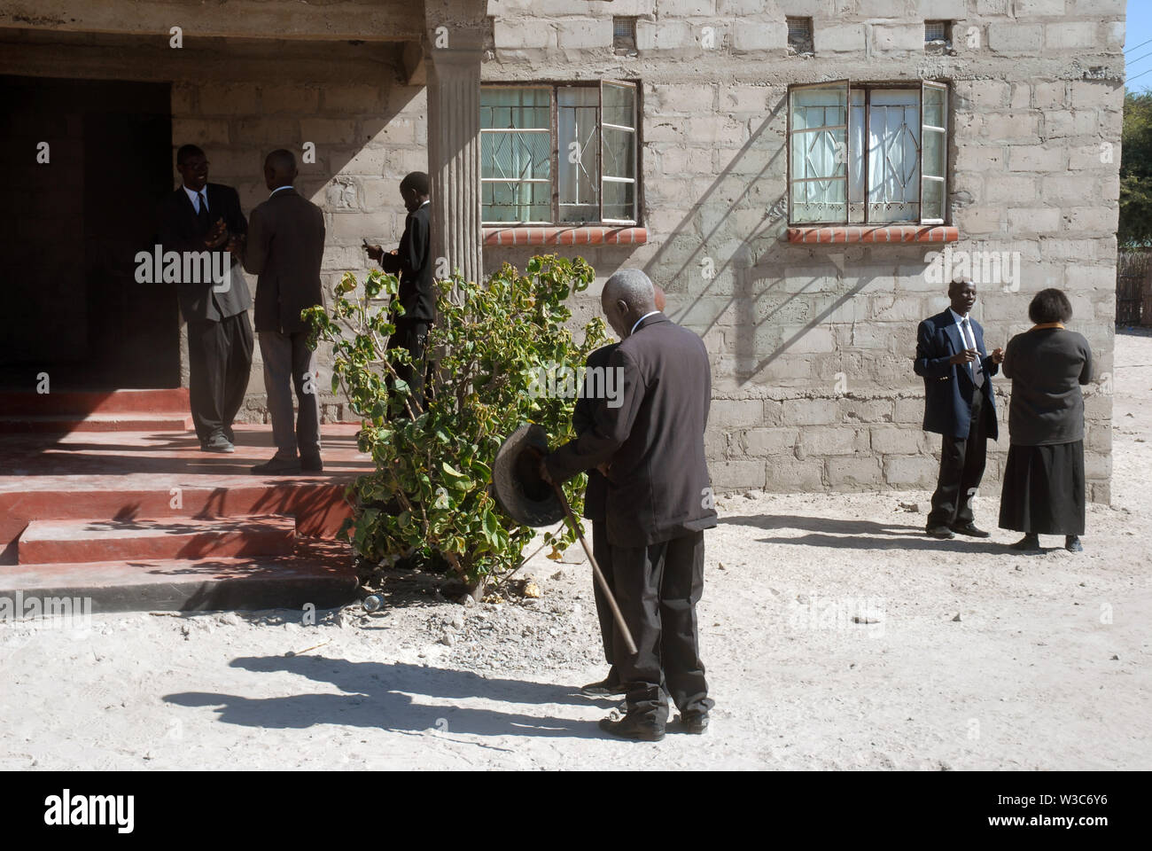 Church goers outside the Faith Turbenacle Pentecost Church, Mwandi ...