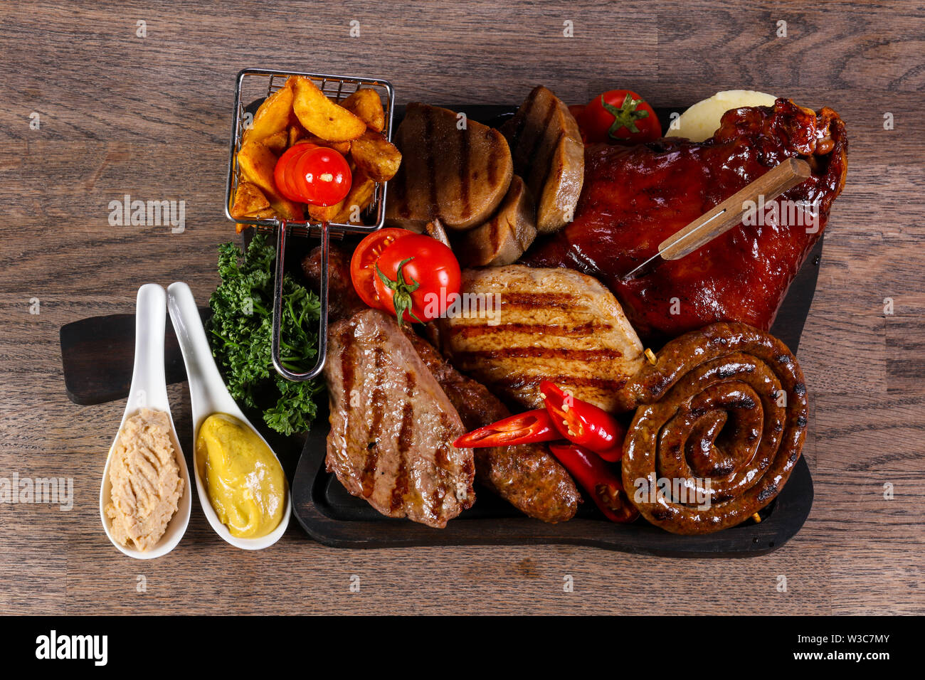 Grilled meat mix plate - beef, pork and chicken Stock Photo - Alamy
