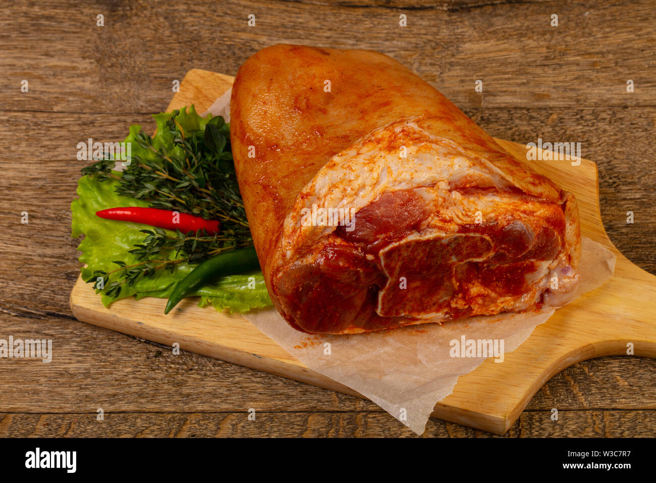 Raw pork knuckle marinated for cooking Stock Photo - Alamy