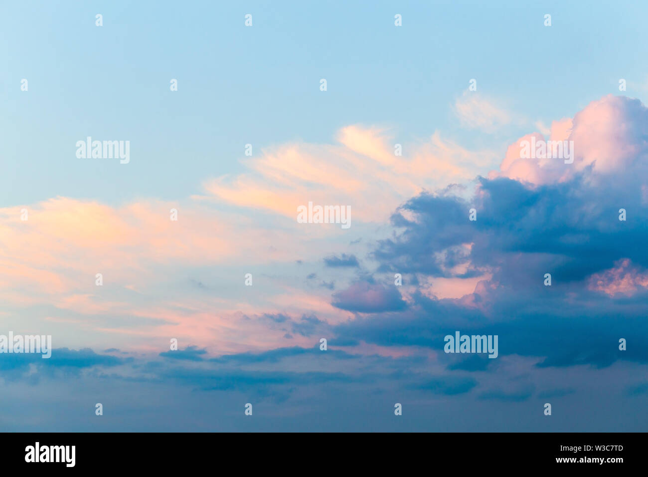 Evening sunset cloudy sky background Stock Photo - Alamy