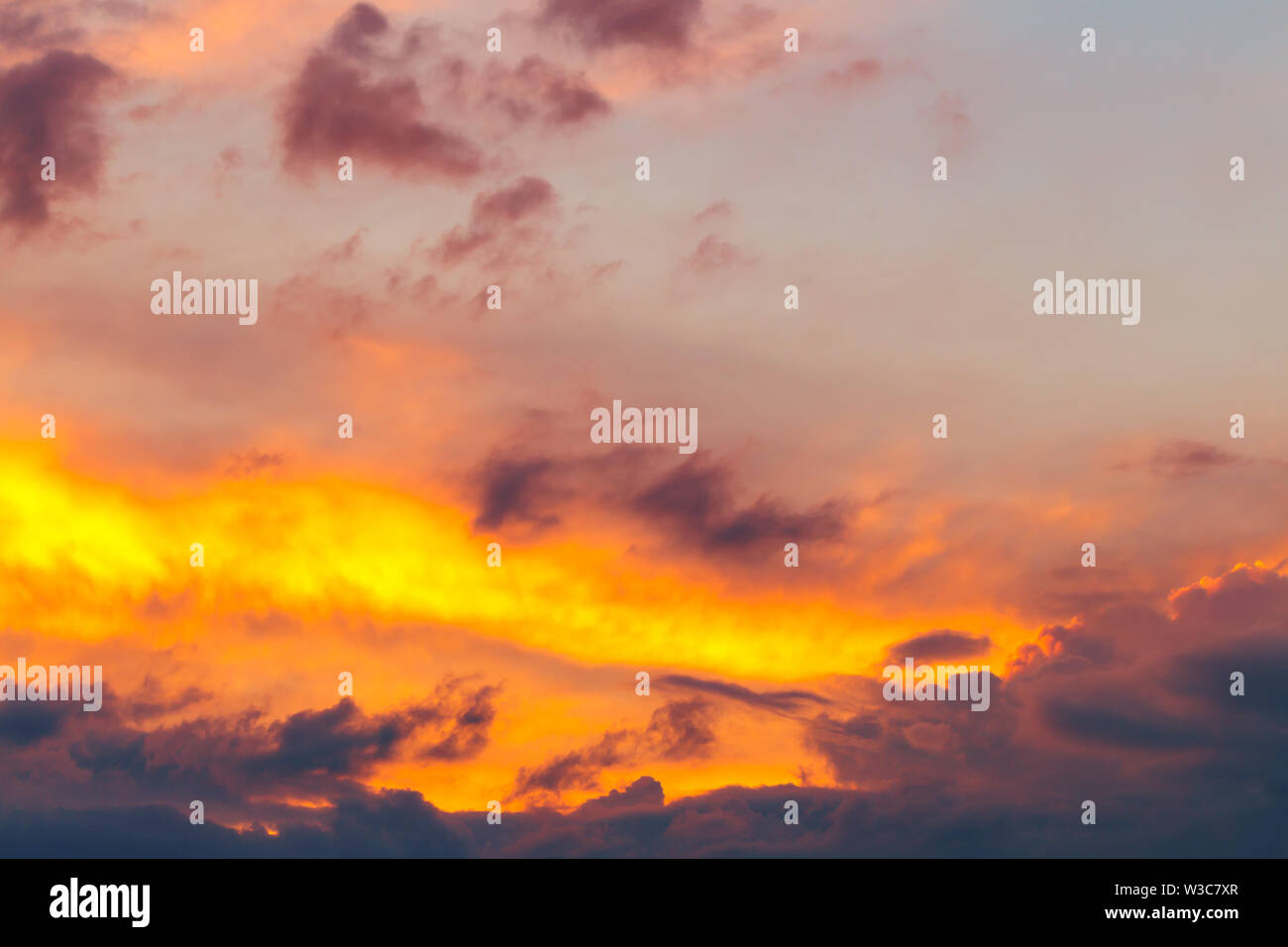 Abstract red sunset cloudy sky background Stock Photo - Alamy