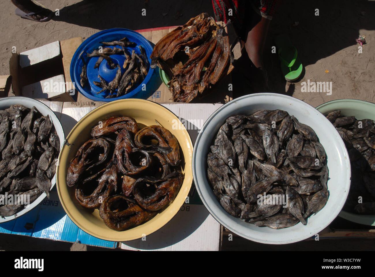 Lady selling fish at Mwandi market, Mwandi, Zambia, Africa Stock Photo ...