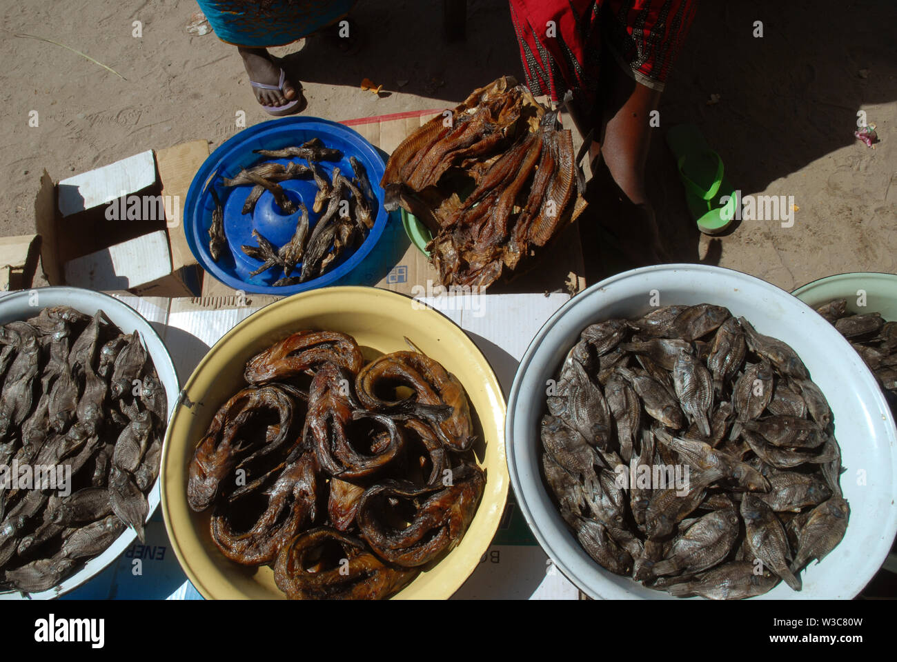 Lady selling fish at Mwandi market, Mwandi, Zambia, Africa Stock Photo ...