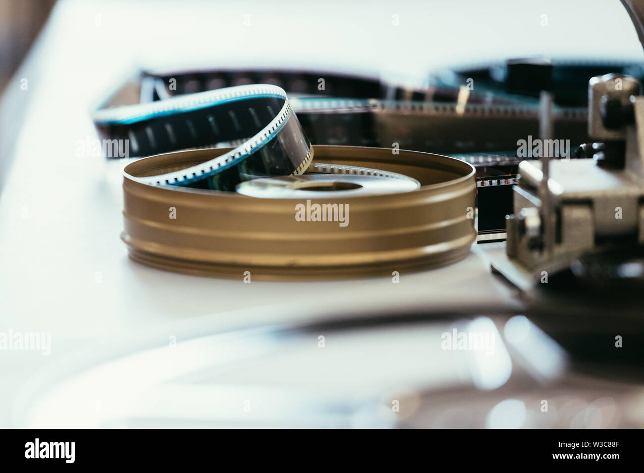 Filmstrip or film reel on a cutting table, vintage film production in ...