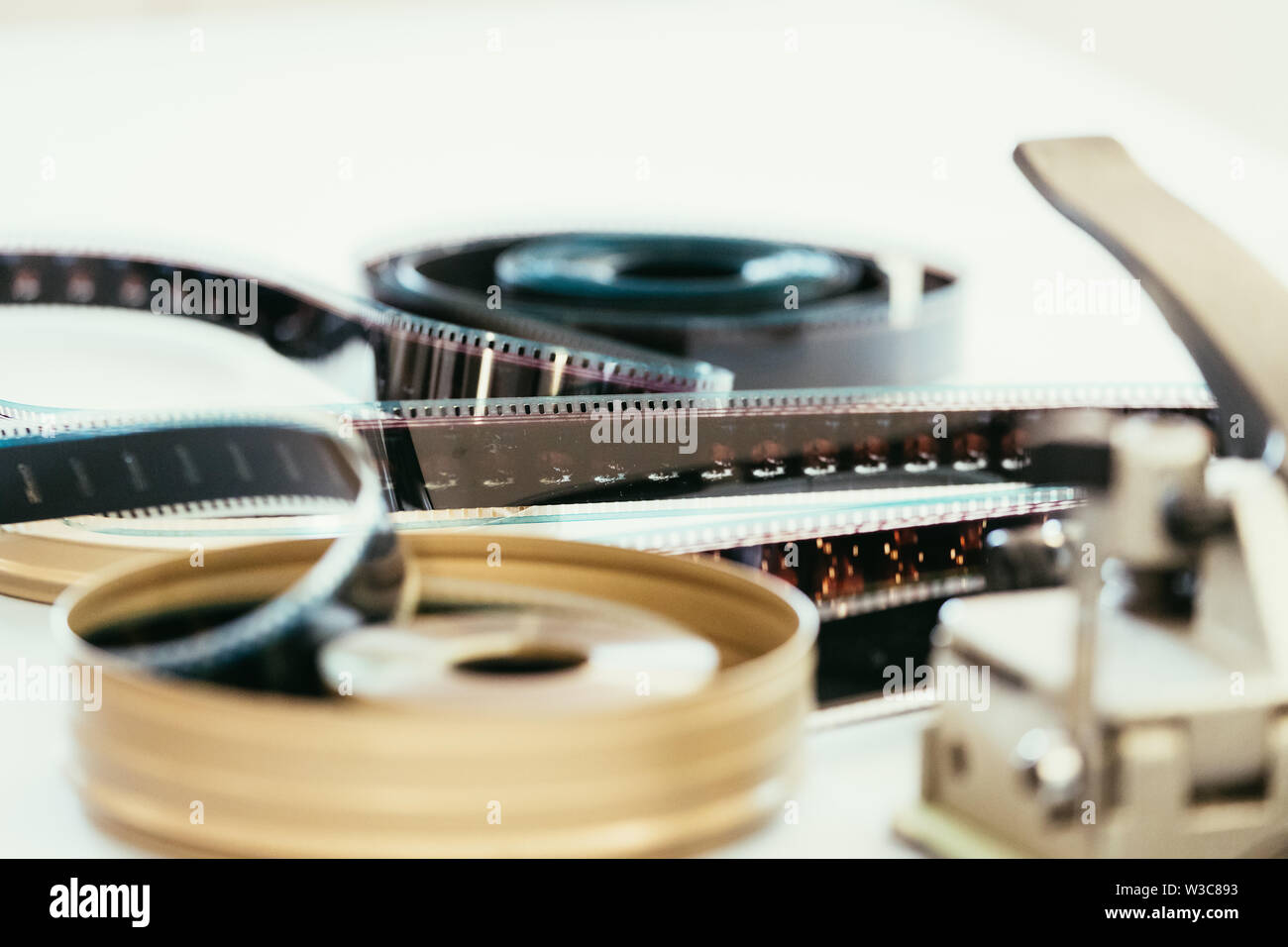 Filmstrip or film reel on a cutting table, vintage film production in ...