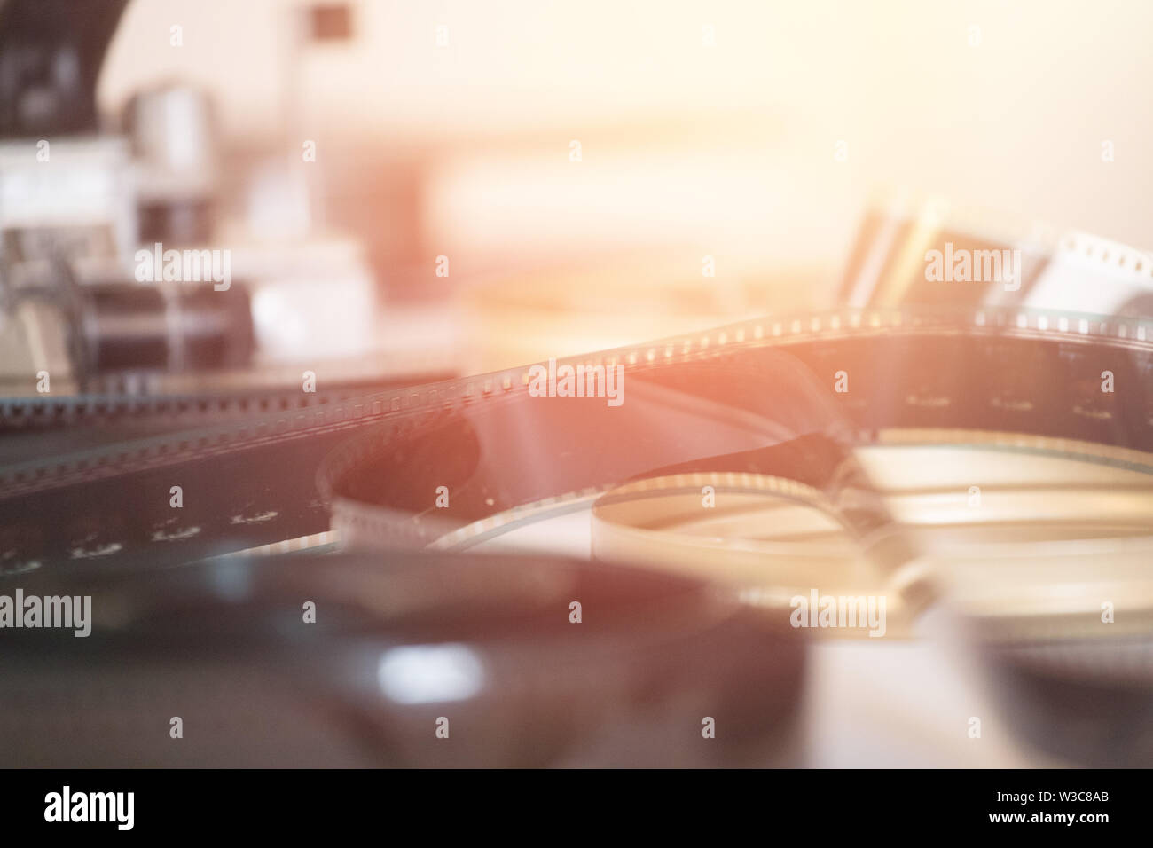 Filmstrip or film reel on a cutting table, vintage film production in ...