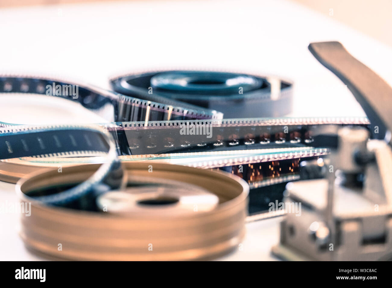 Filmstrip or film reel on a cutting table, vintage film production in ...