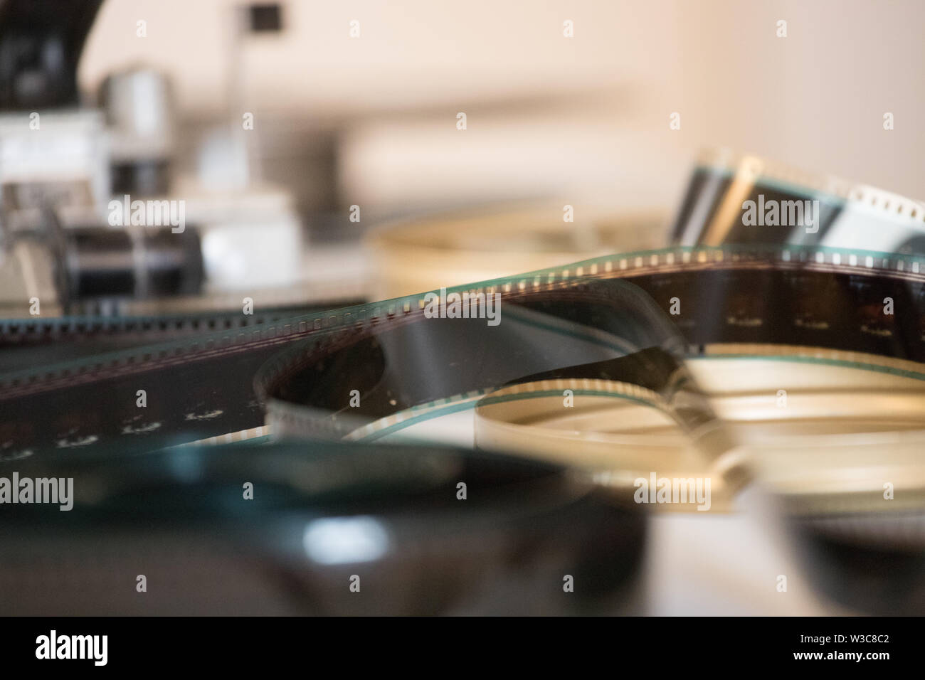 Filmstrip or film reel on a cutting table, vintage film production in ...