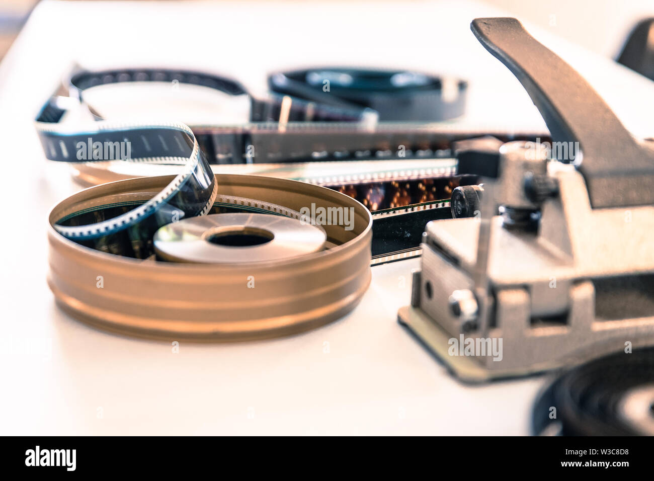 Filmstrip or film reel on a cutting table, vintage film production in ...